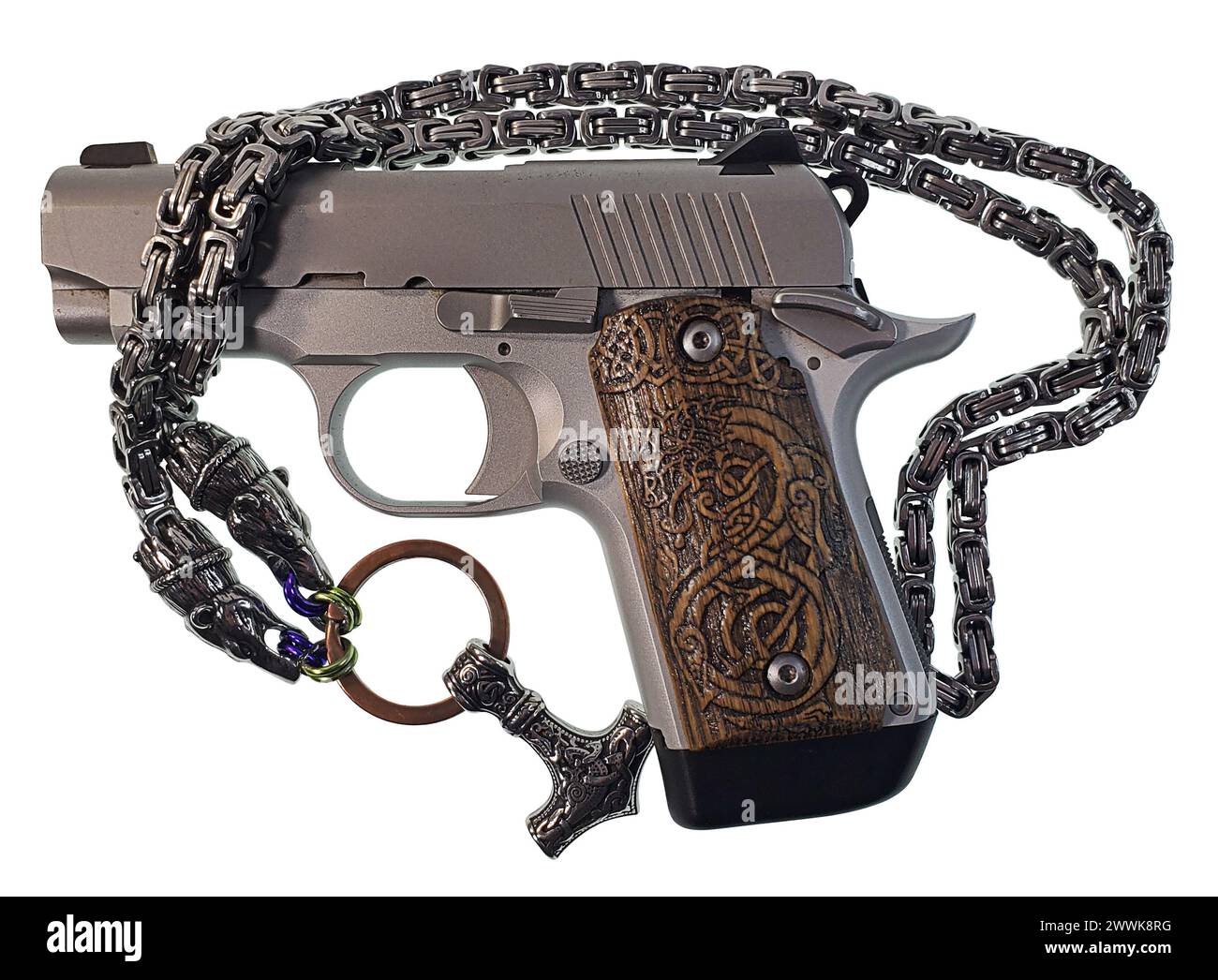 Silver metal gun with Celtic Engraved grip and Thor's hammerr necklace ...