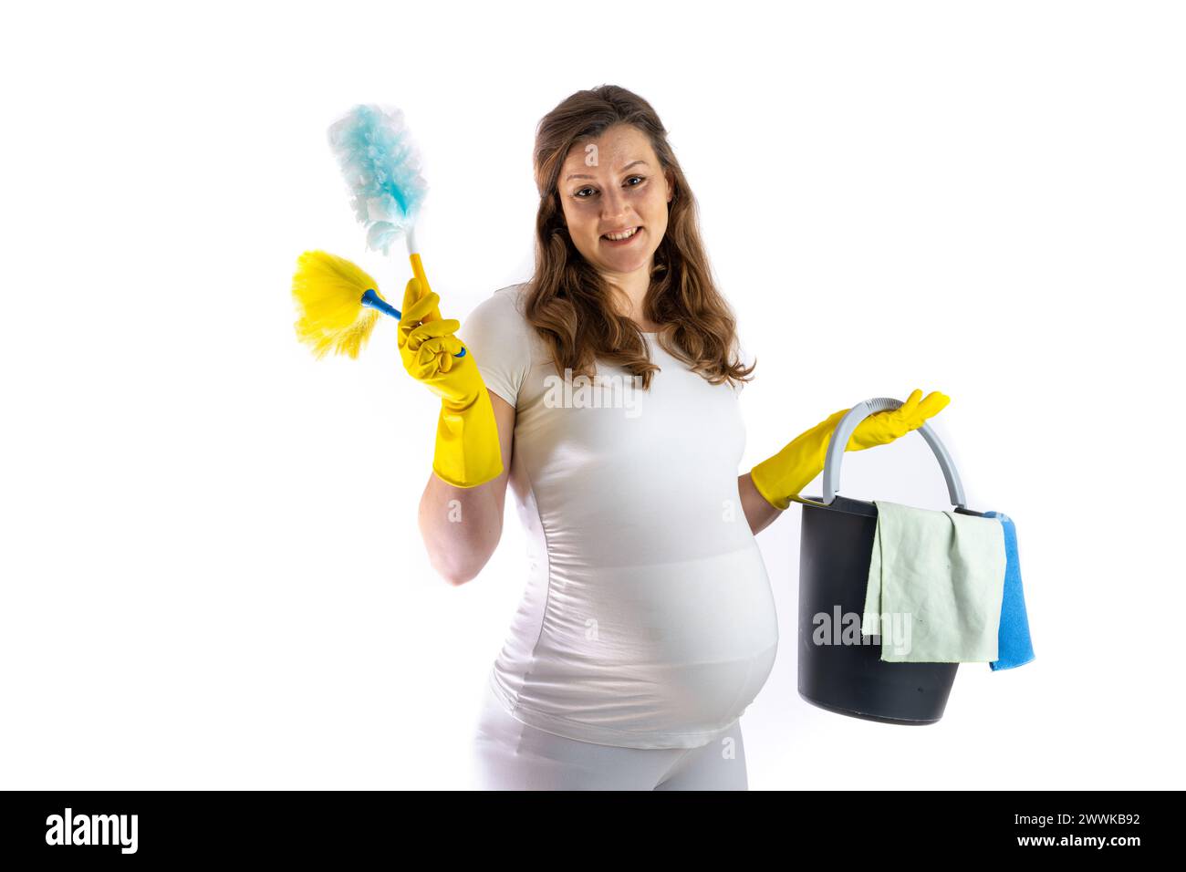 Description: Pregnant mother with round belly and smiling facial ...