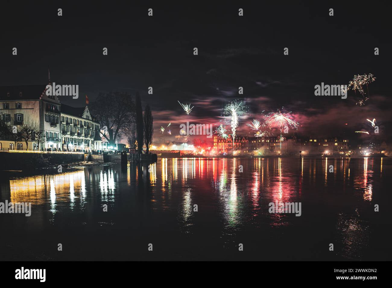 Description: New Year's Eve midnight fireworks over the promenade of ...