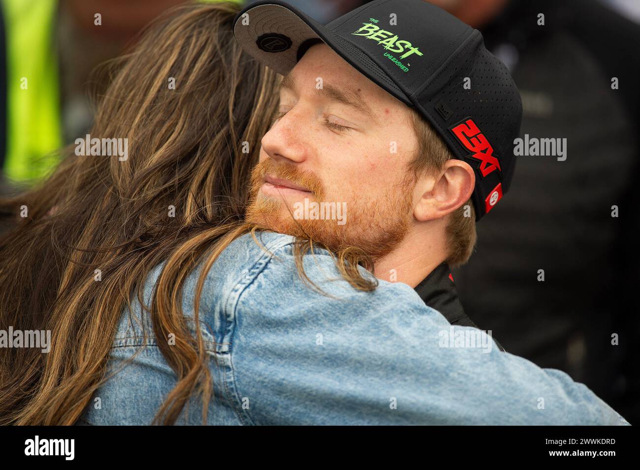 The Americas. 24th Mar, 2024. Tyler Reddick (45) with 23XI Racing hugs ...