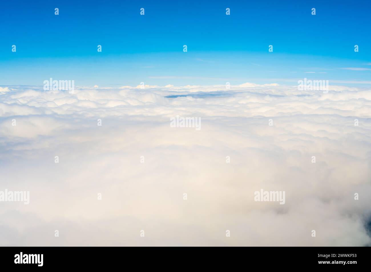 Description: Side view of white cloud cover during the day with blue ...