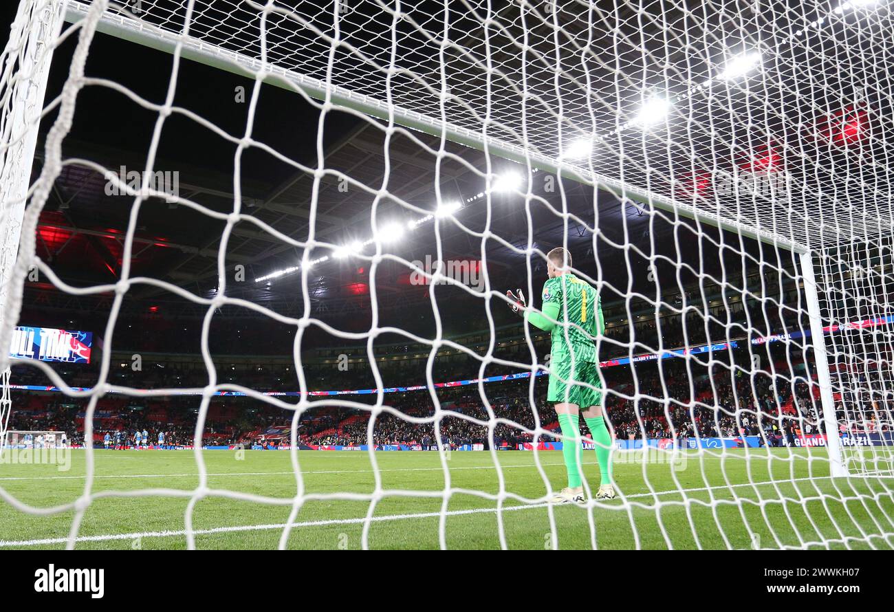 London, UK. 23rd Mar, 2024. Bento, the goalkeeper of Brazil pray's ...