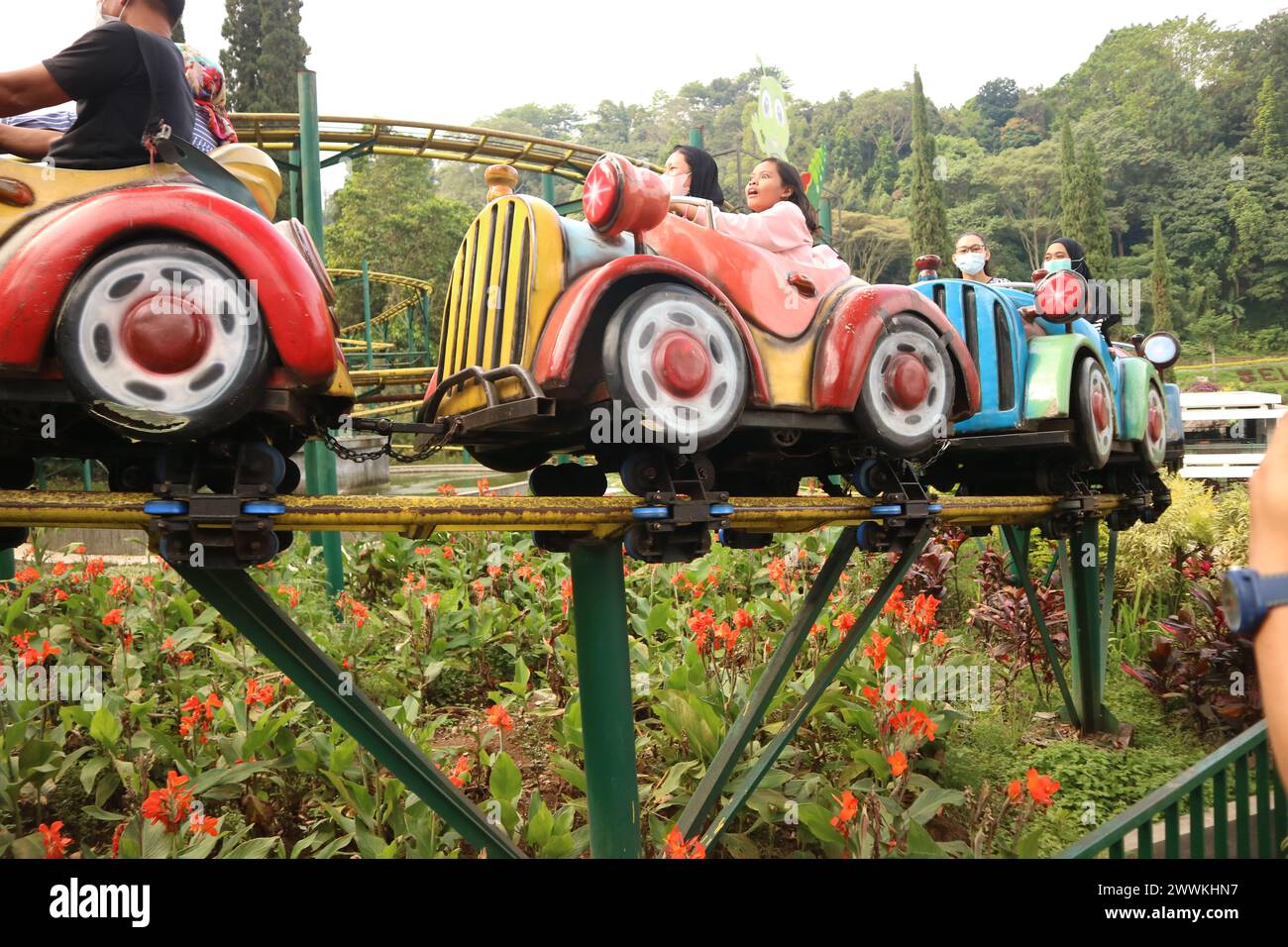 Roller coaster ride at Selecta Batu Amusement Park, East Java Stock Photo - Alamy