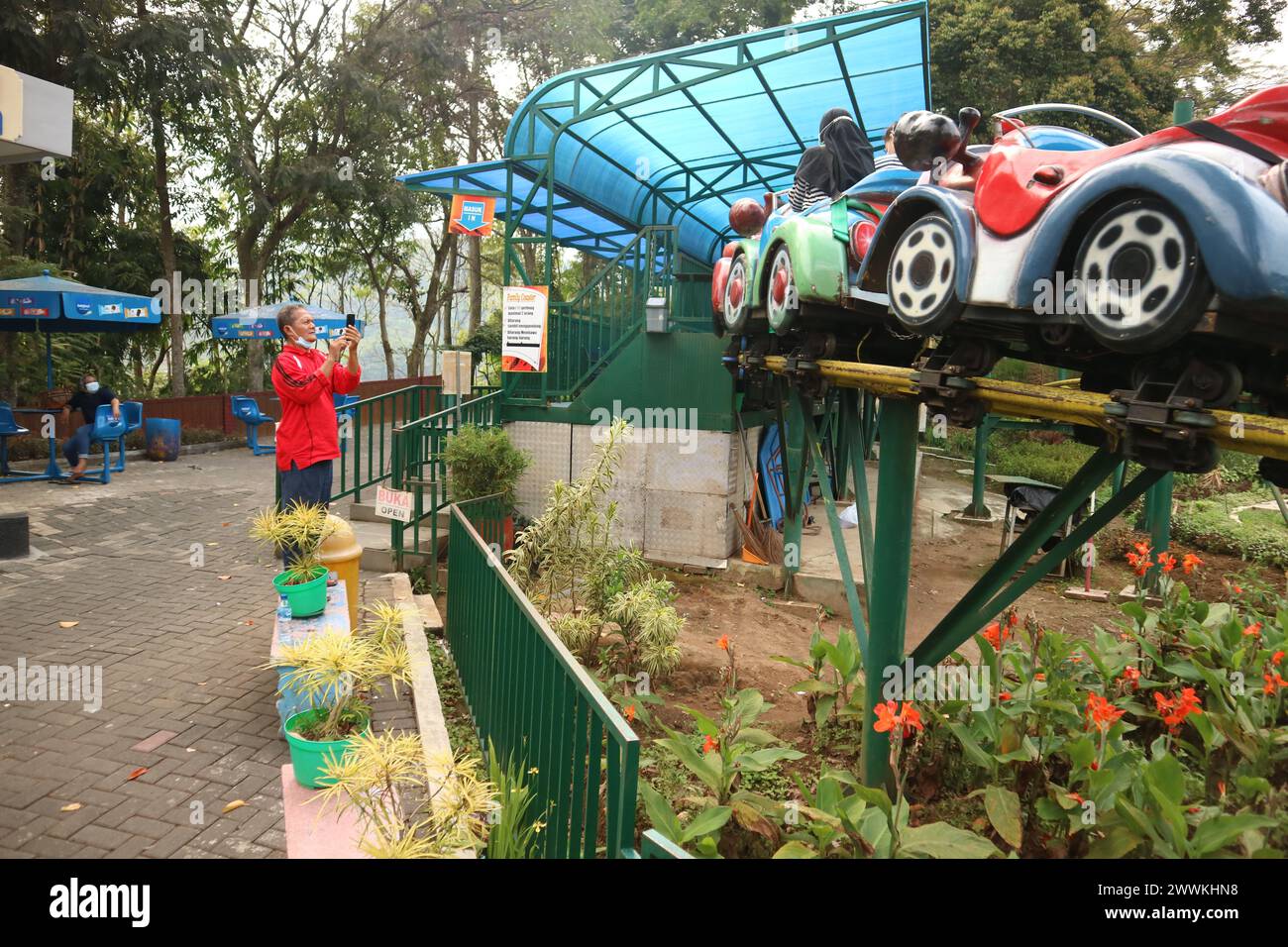 Roller coaster ride at Selecta Batu Amusement Park, East Java Stock Photo - Alamy
