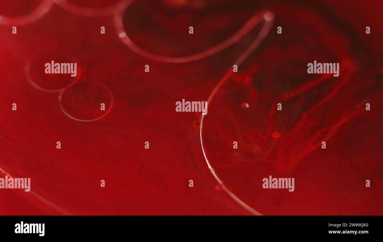 Oil fluid droplets color mist red ink water bubble Stock Photo - Alamy