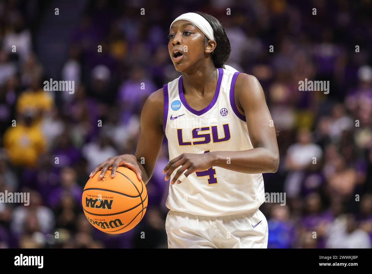 Baton Rouge, LA, USA. 24th Mar, 2024. LSU's Flau'jae Johnson (4) brings ...