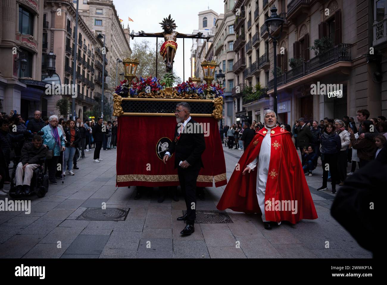 Barcelona, Spain. 24th Mar, 2024. A member of the Catholic Church walks ...