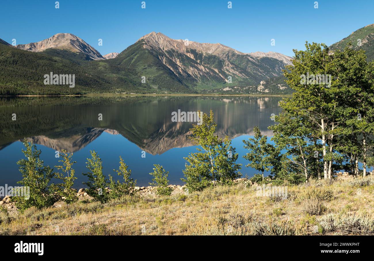 Mount Hope and Twin Peaks are reflected on the West Twin Lake in ...
