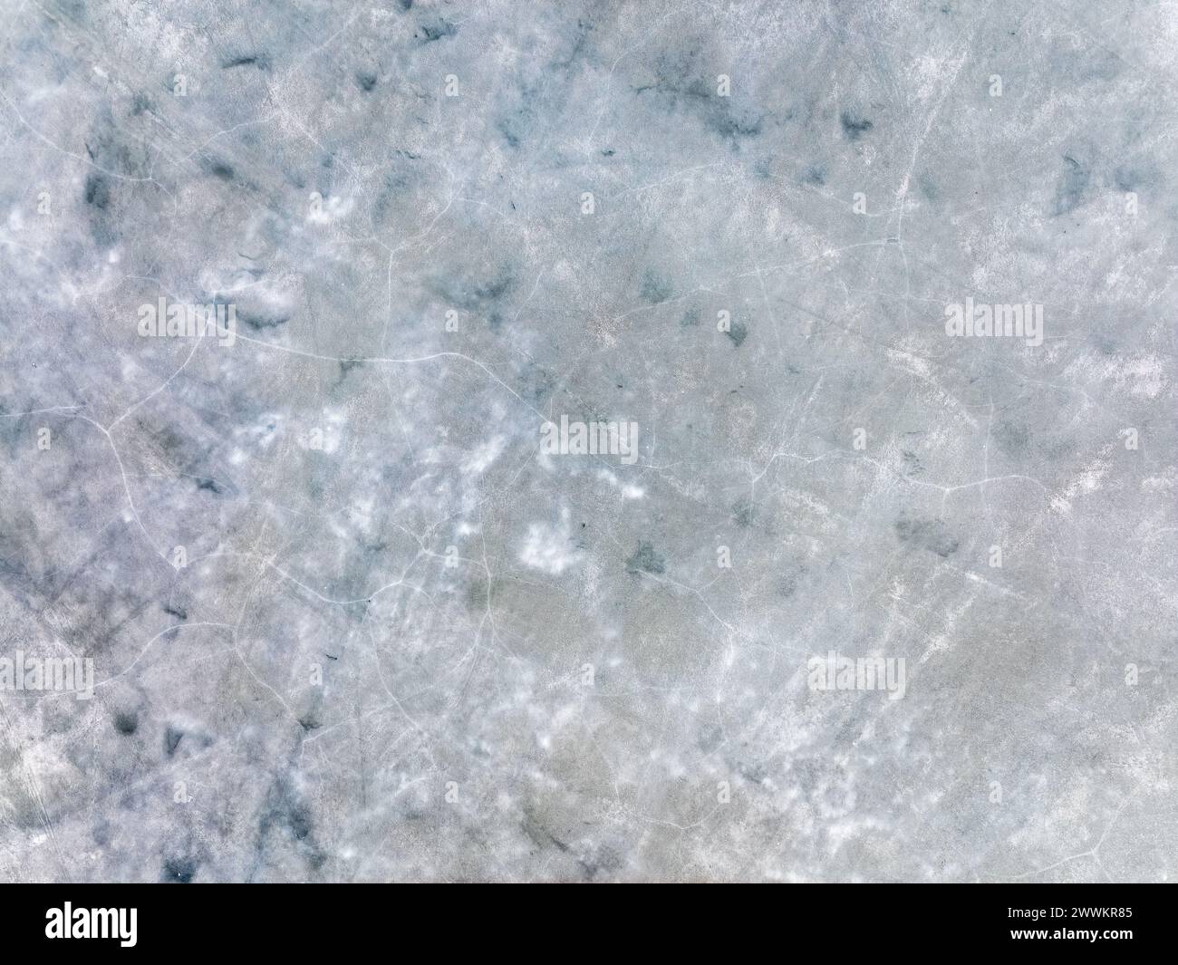 Aerial Top-Down View of Cracked, Broken, and Melting Ice on a Water ...