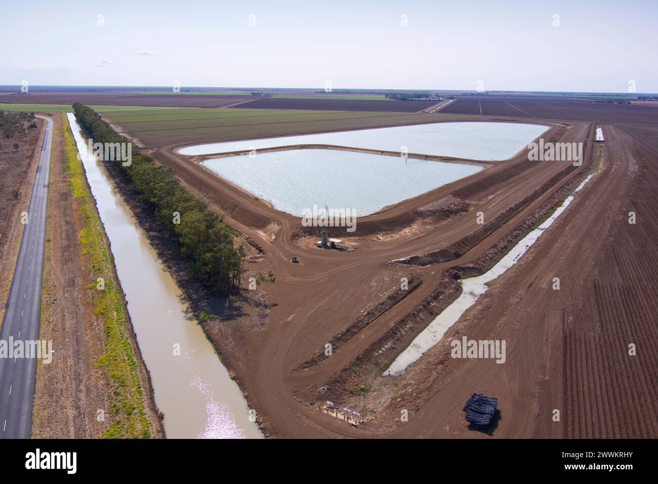 Aerial of earth dam on farm water storage near St George Queensland ...