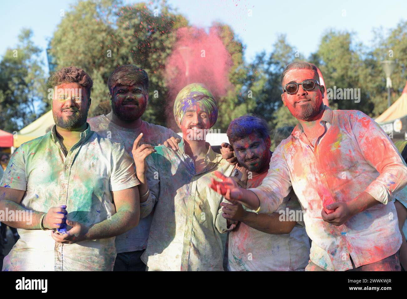 Indian and Nepalian people celebrating Festival of colors Holi at ...