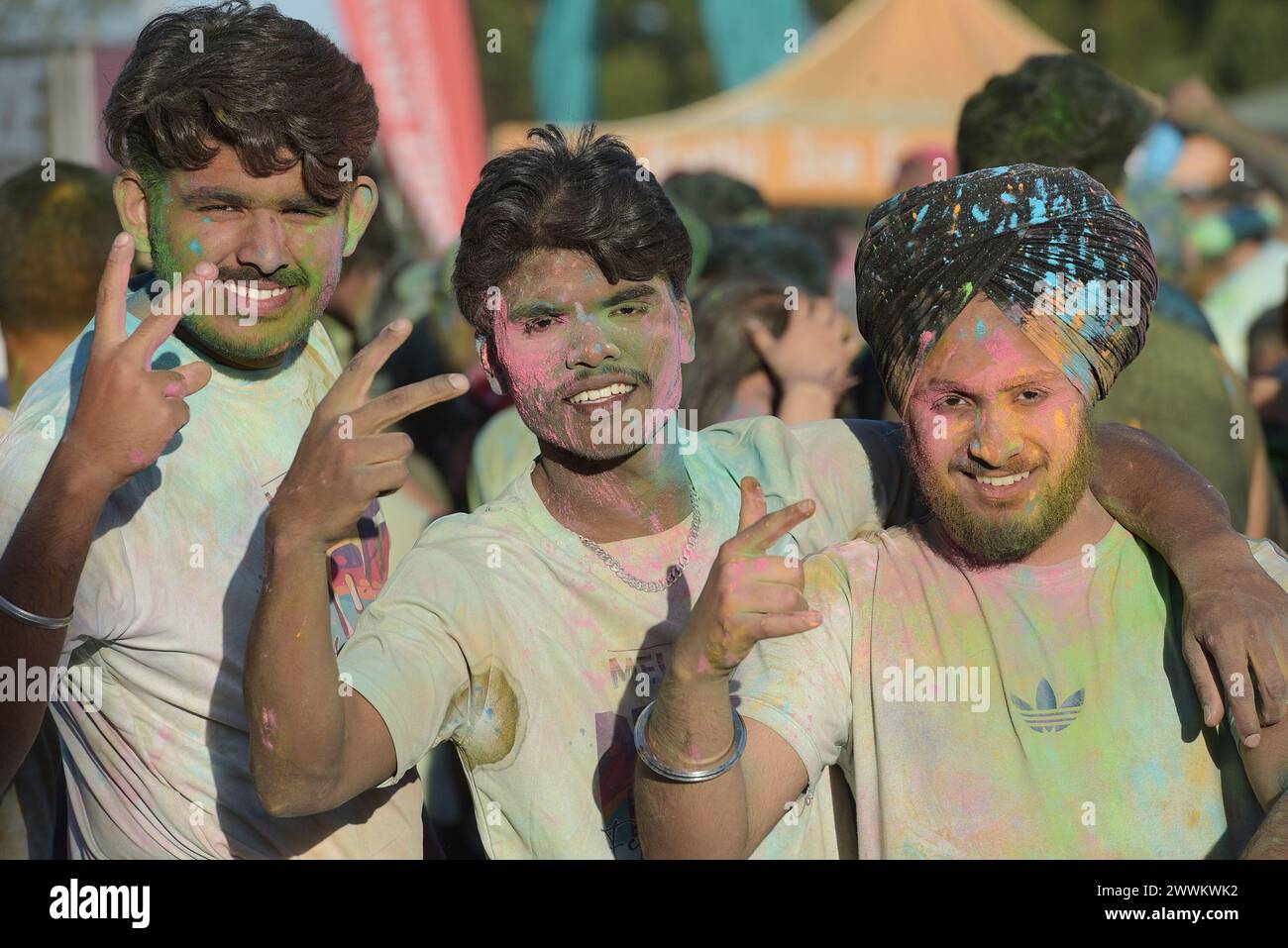 Indian and Nepalian people celebrating Festival of colors Holi at ...