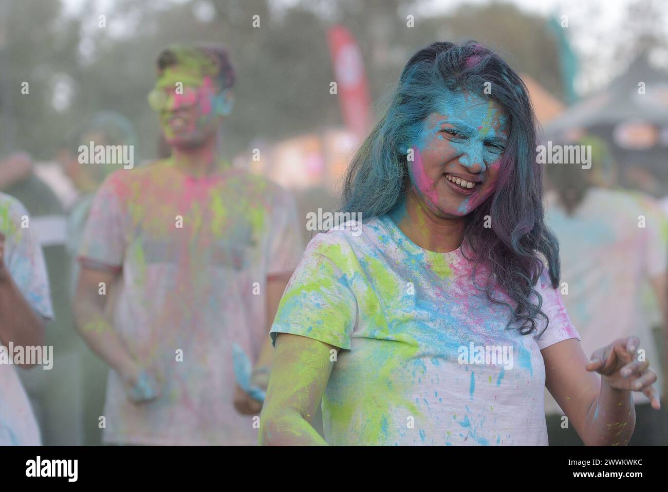 Indian and Nepalian people celebrating Festival of colors Holi at ...