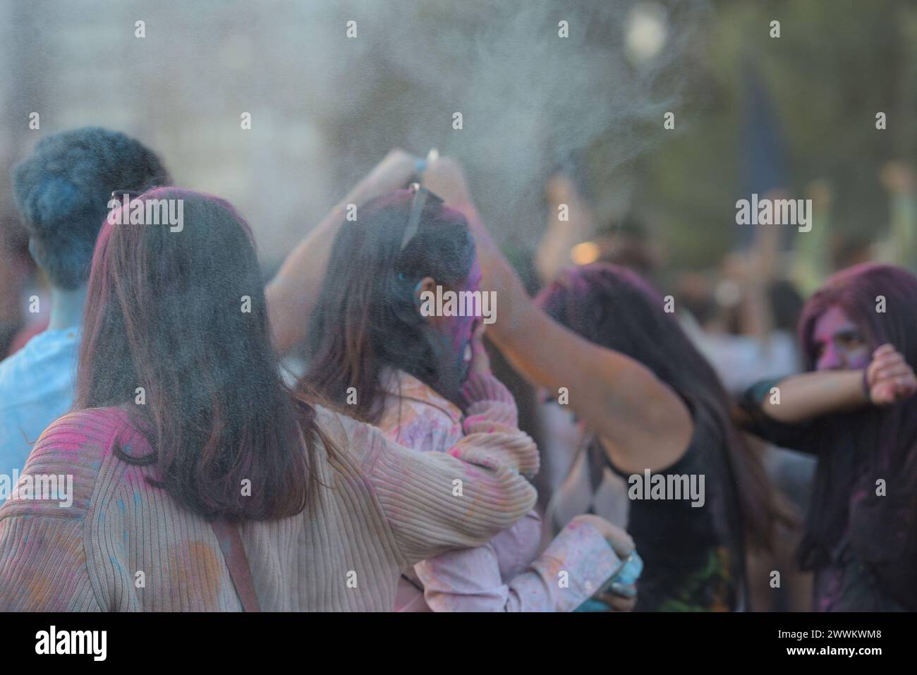 Indian and Nepalian people celebrating Festival of colors Holi at ...
