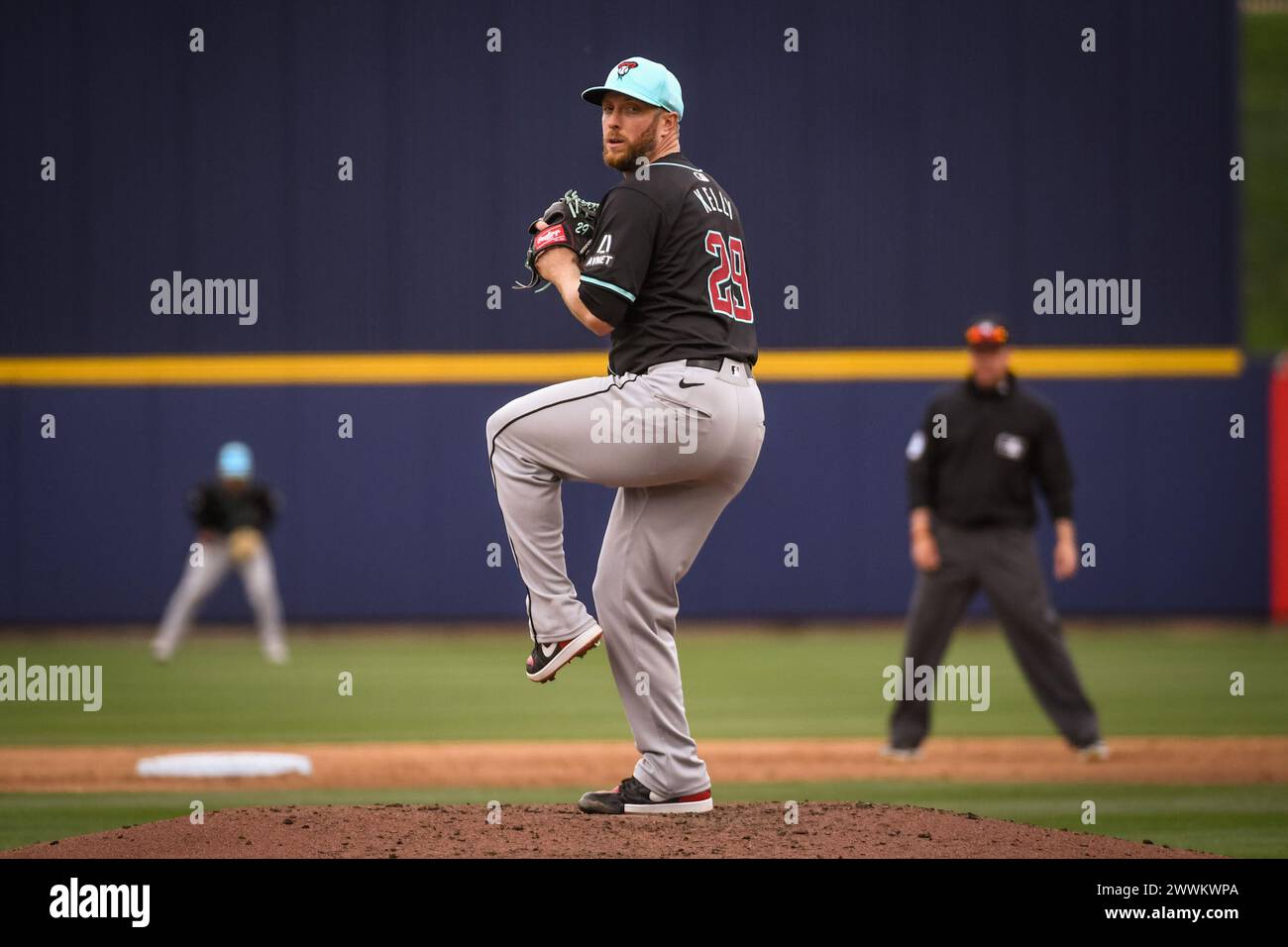 Arizona Diamondbacks starting pitcher Merrill Kelly (29) throws against ...