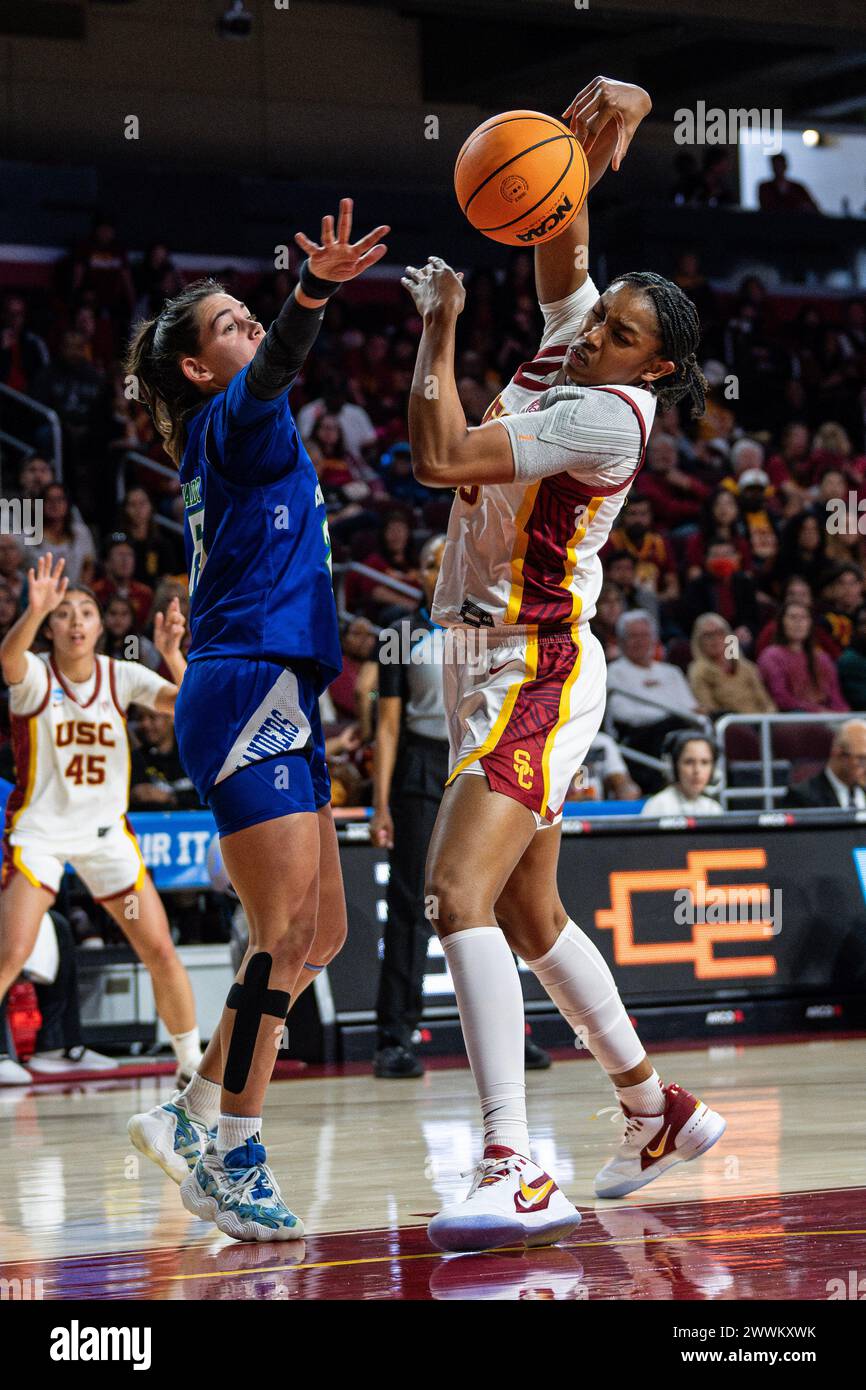 Texas A&M-CC Islanders guard Mireia Aguado (25) and USC Trojans center Rayah Marshall (13) fight ...
