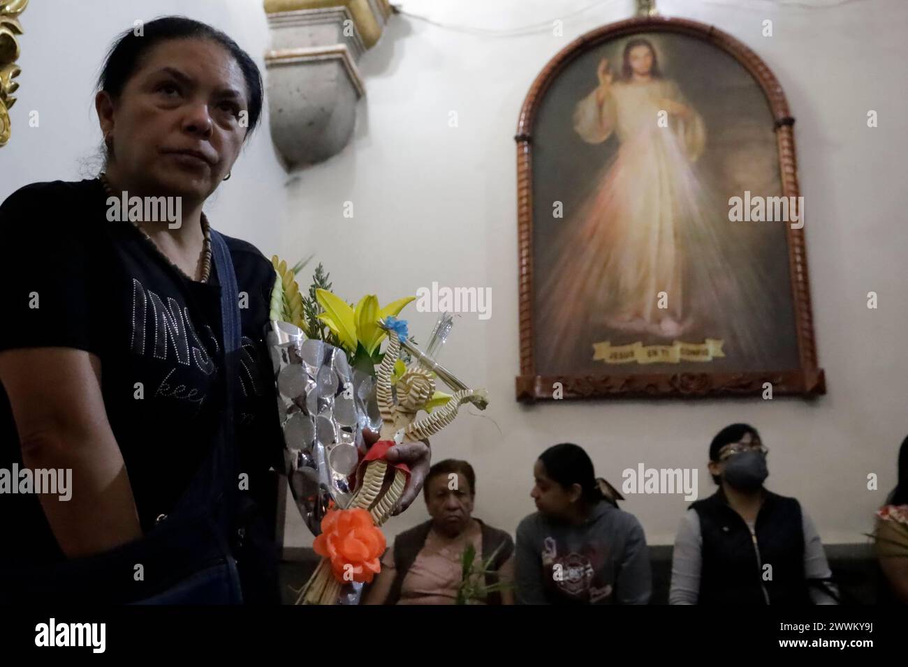 Non Exclusive: A Catholic devotee attends whit their palm branches at ...