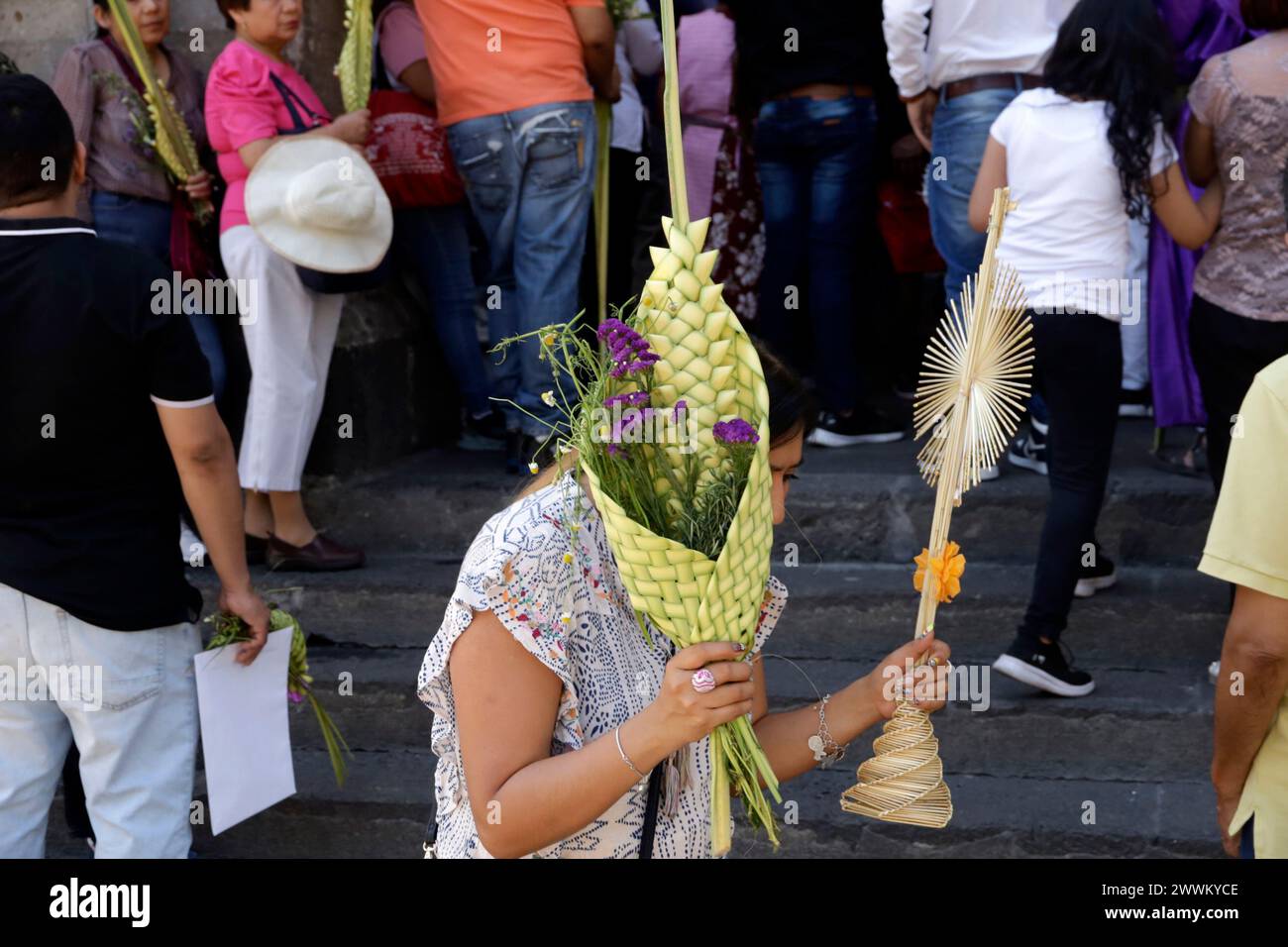 Non Exclusive: A Catholic devotee attends whit their palm branches at ...