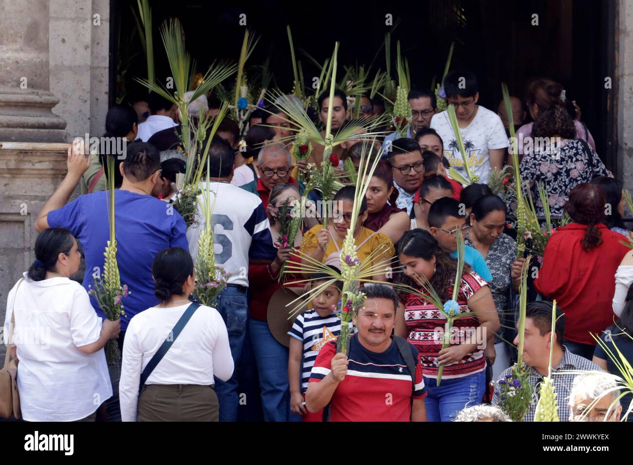 Non Exclusive: A Catholic devotee attends whit their palm branches at ...