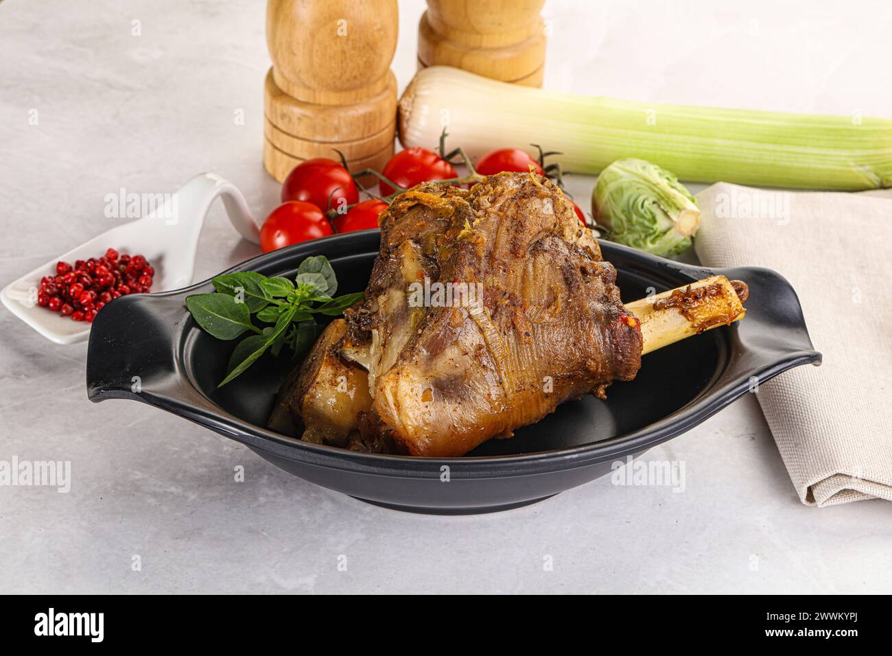 Baked Lamb shank with bone marinated in spices Stock Photo - Alamy