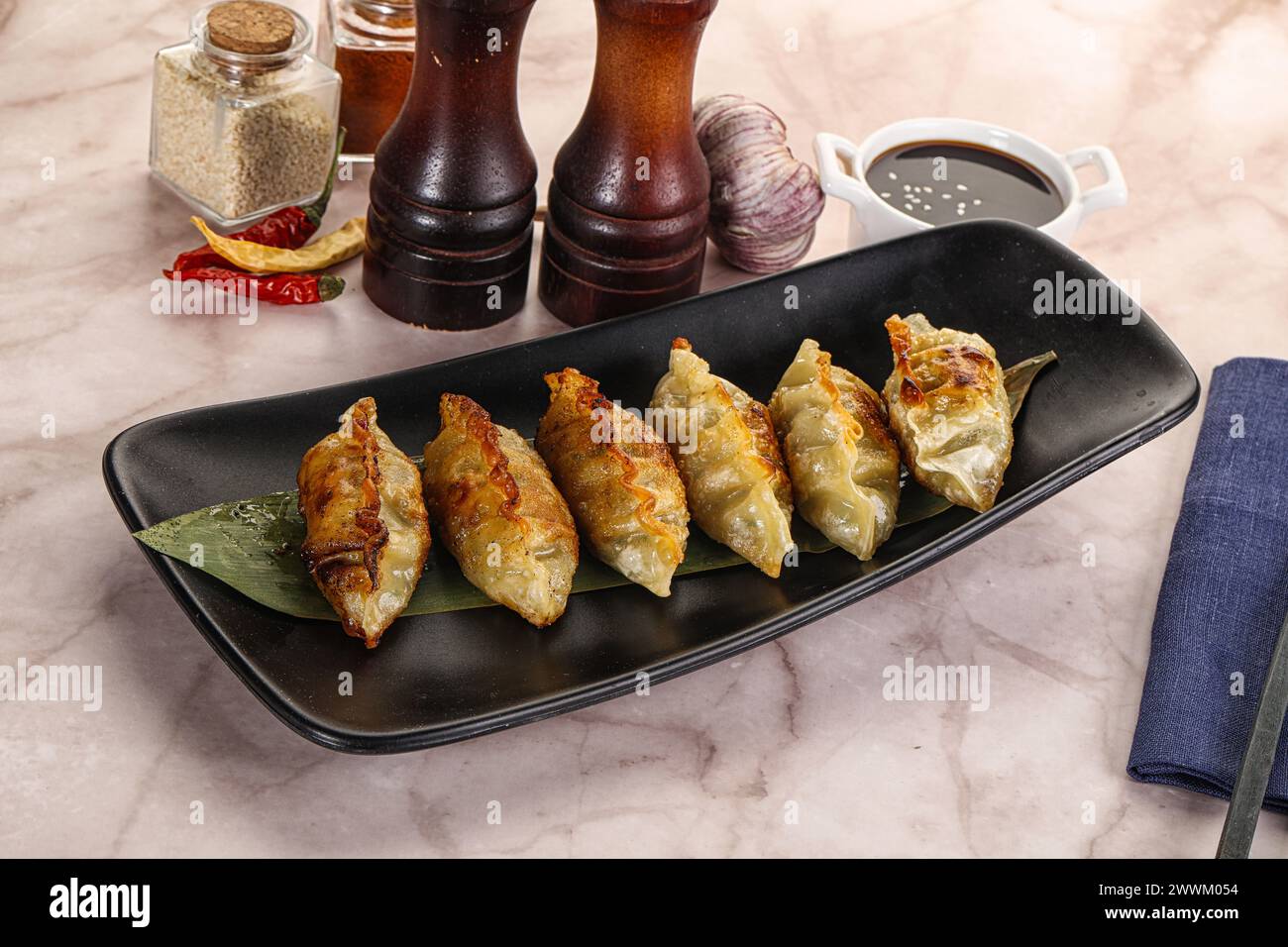 Fried Japanese stuffed dumplings - Gyoza with meat Stock Photo - Alamy