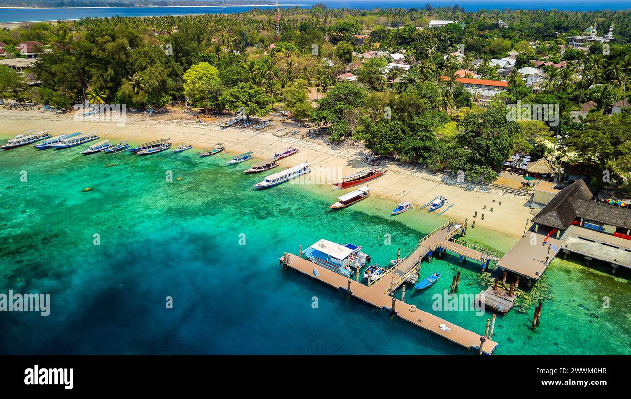 A small harbour and beach on a hot, tropical island (Gili Islands ...