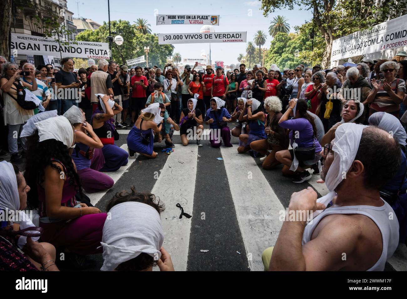 Buenos Aires, Argentina. 24th Mar, 2024. Activists perform an artistic ...