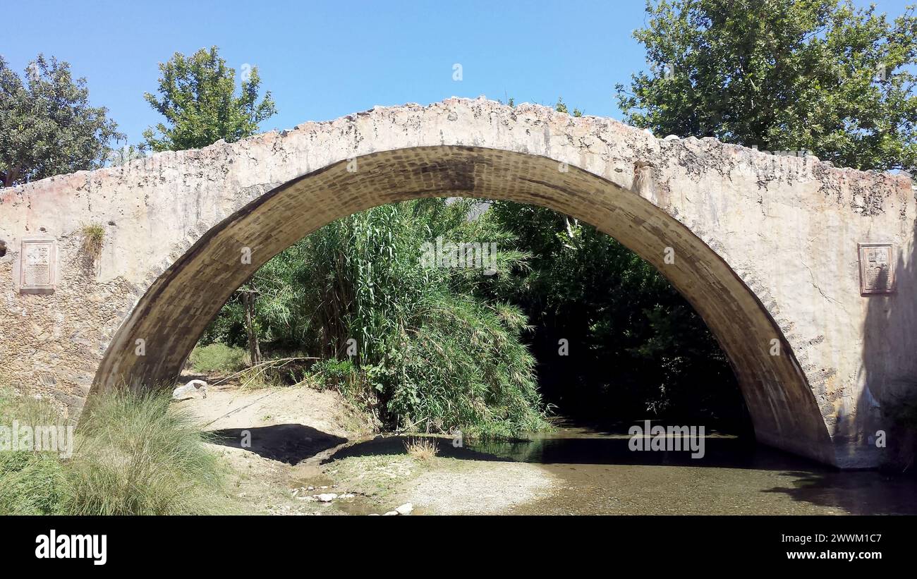 Stone bridge over the River Platis Potamos on the island of Crete ...