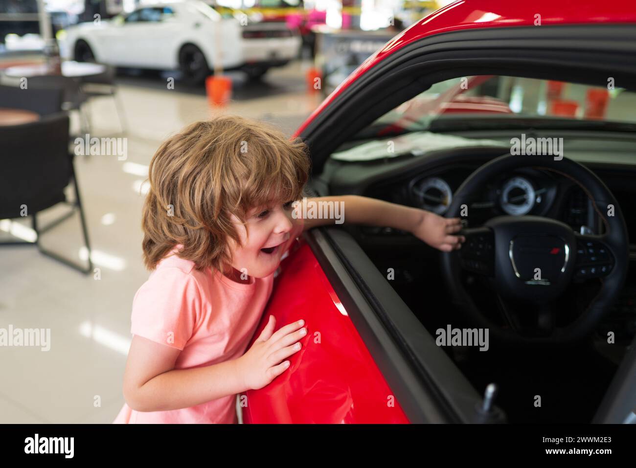 Little Driver. Cute little boy pretending to drive. Kid in car with his ...