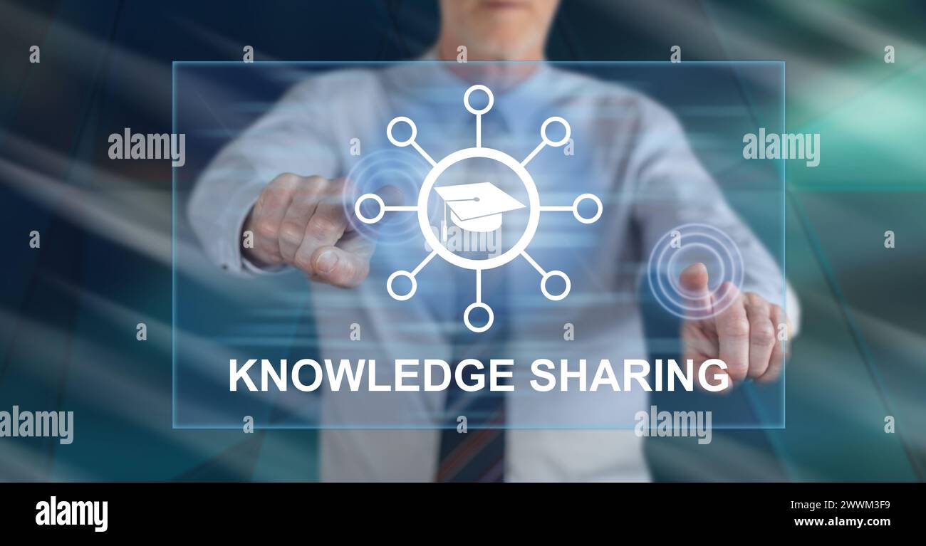 Man touching a knowledge sharing concept on a touch screen with his ...