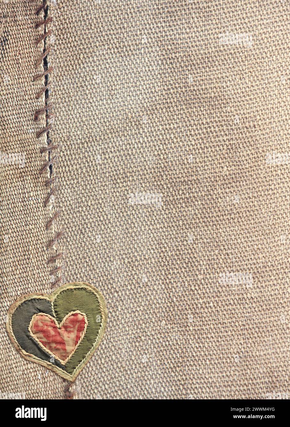 Two pieces of old burlap sewn together with thread and fabric heart ...
