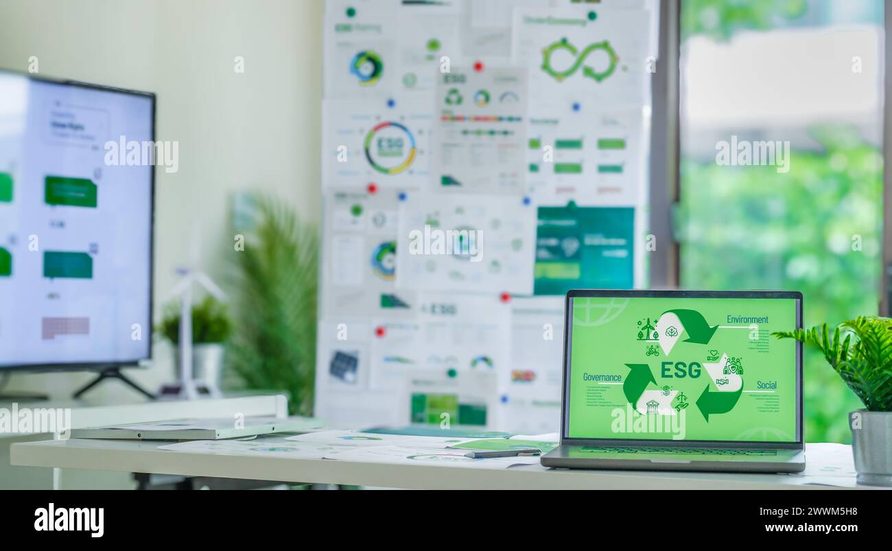 ESG ( environment, social,governance) recycle sign on laptop screen ...