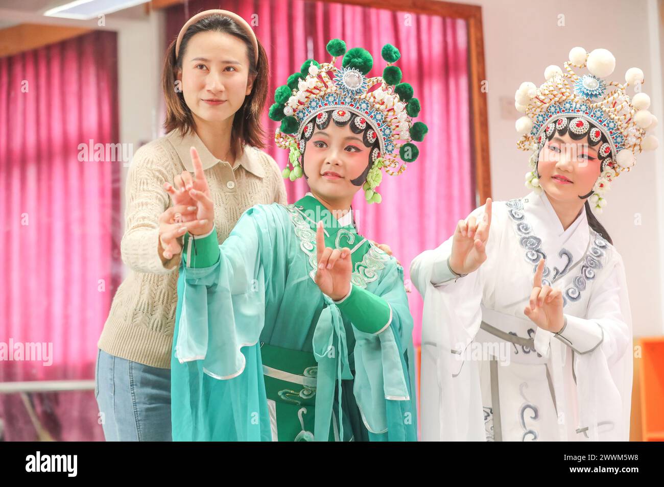 HUZHOU, CHINA - MARCH 25, 2024 - A traditional Chinese opera teacher ...