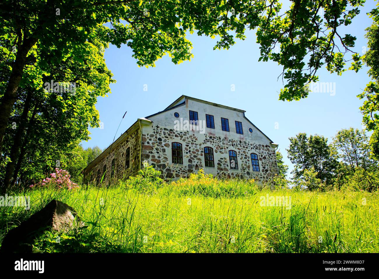 Sjundby Manor, a medieval stone castle built in the 1560s, and garden ...