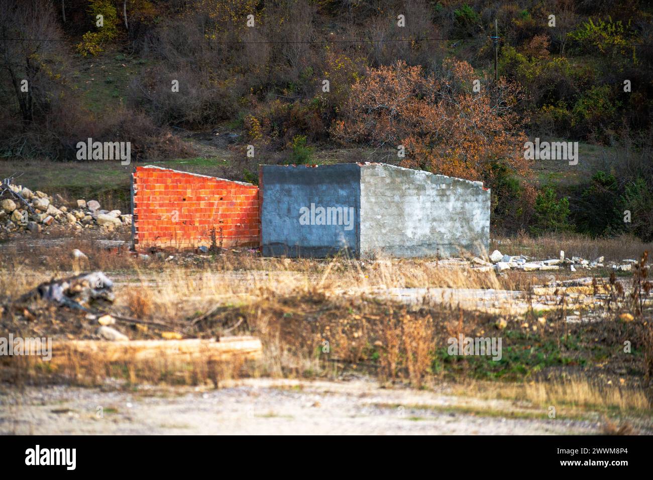 Quaint and cozy, stone and brick-walled small houses stand as charming ...