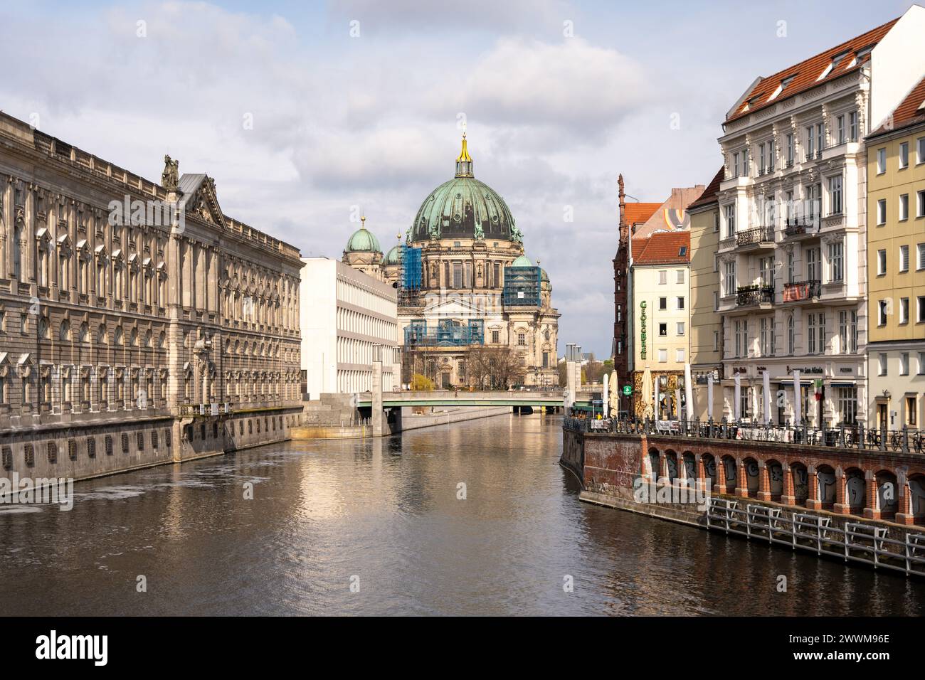 The river flows along the ancient houses of the European city of Berlin ...