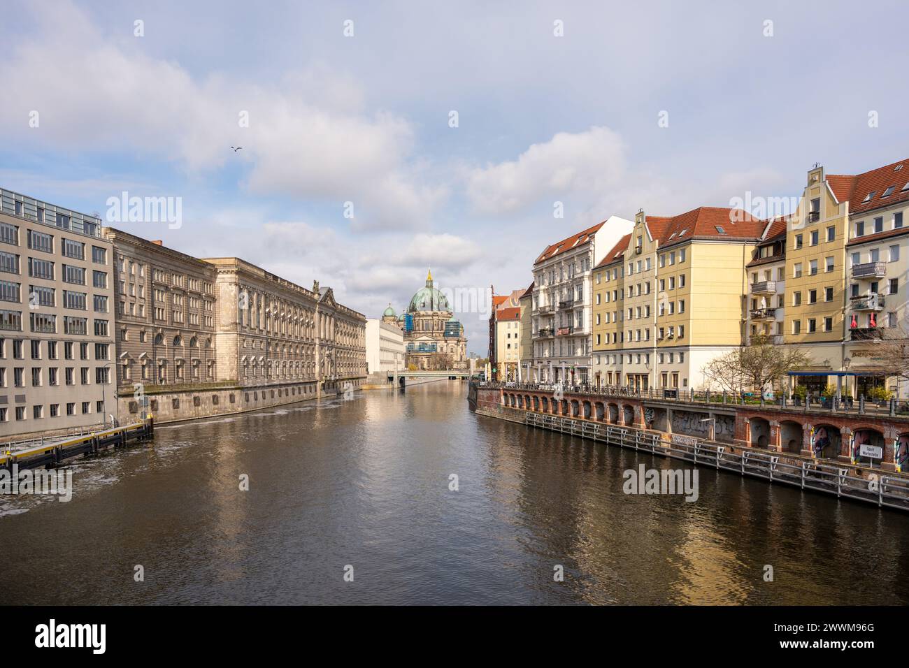 The river flows along the ancient houses of the European city of Berlin ...