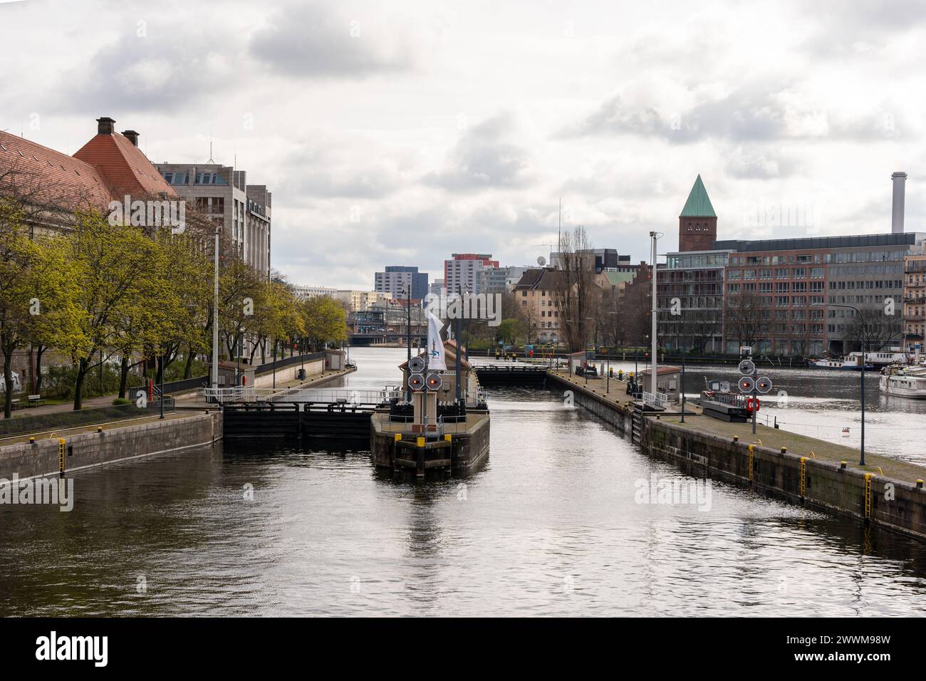 The river flows along the ancient houses of the European city of Berlin ...