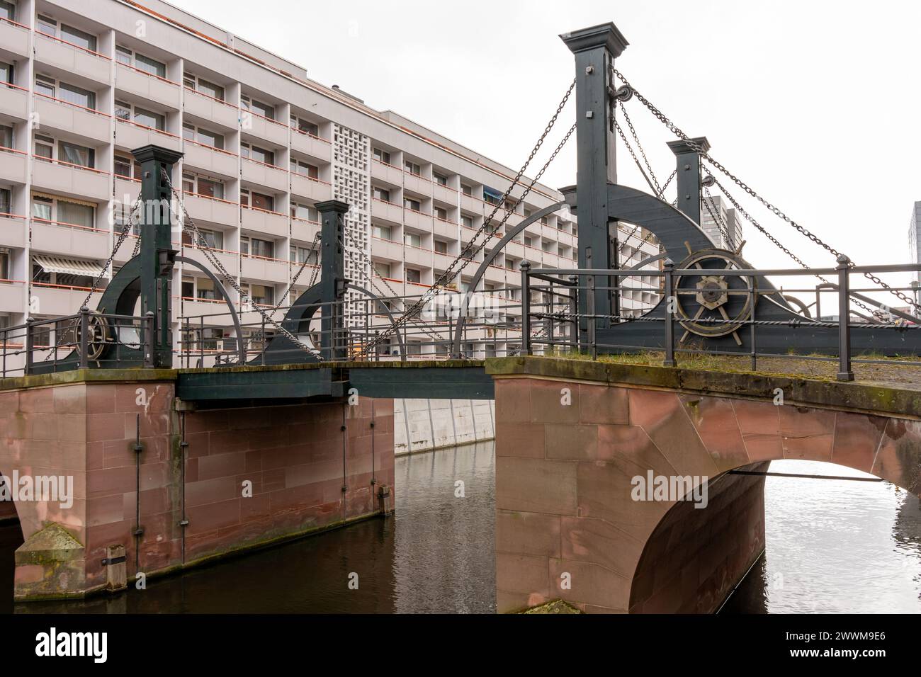 An ancient drawbridge across the river in Berlin. Close-up of the old ...