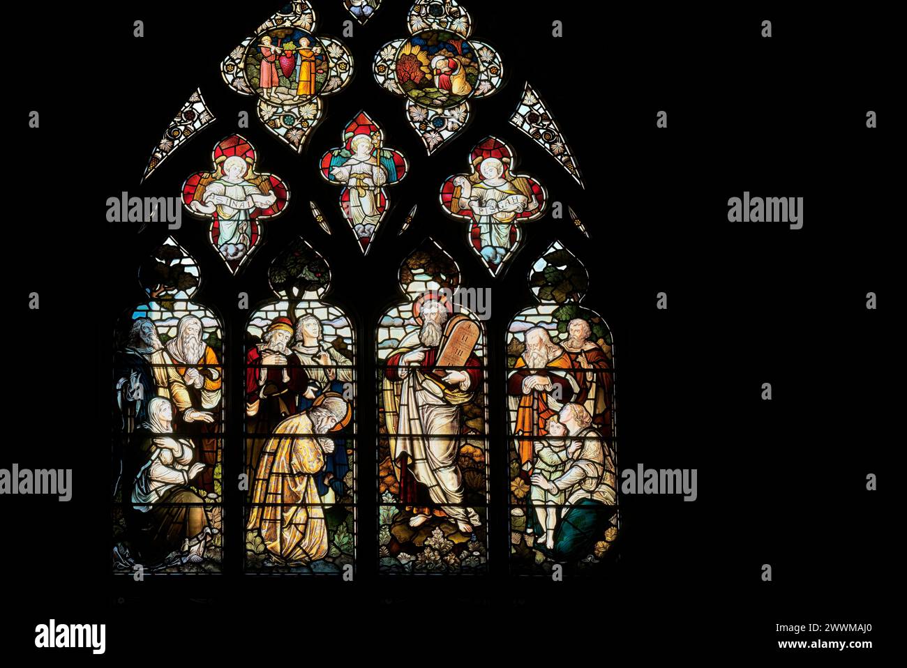 Moses with the ten commandments inscribed on stone tablets Stock Photo ...