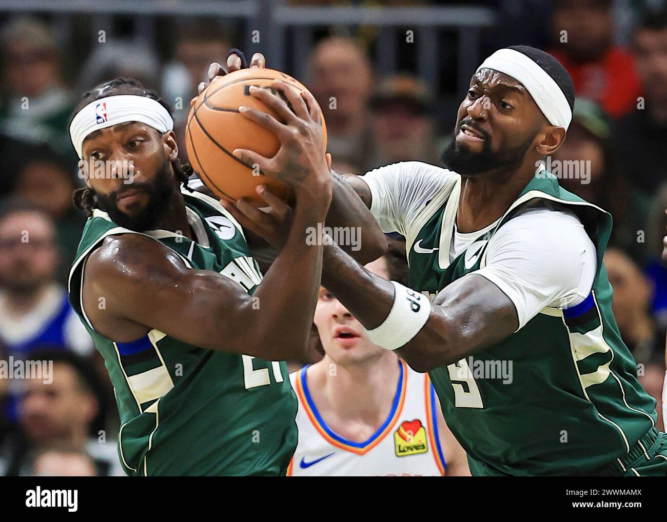Milwaukee, USA. 24th Mar, 2024. Milwaukee Bucks' Patrick Beverley (L ...