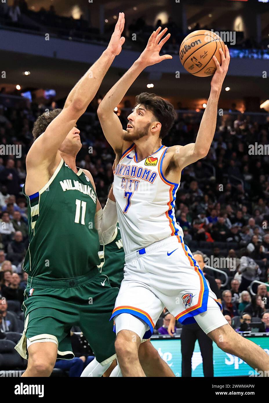 Milwaukee, USA. 24th Mar, 2024. Oklahoma City Thunder's Chet Holmgren ...