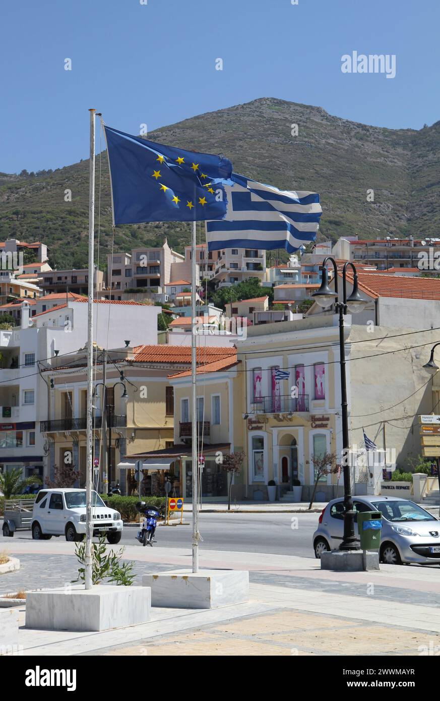 SAMOS, GREECE-JUNE 16, 2013:National Flag of Greece and EU Flag flying ...