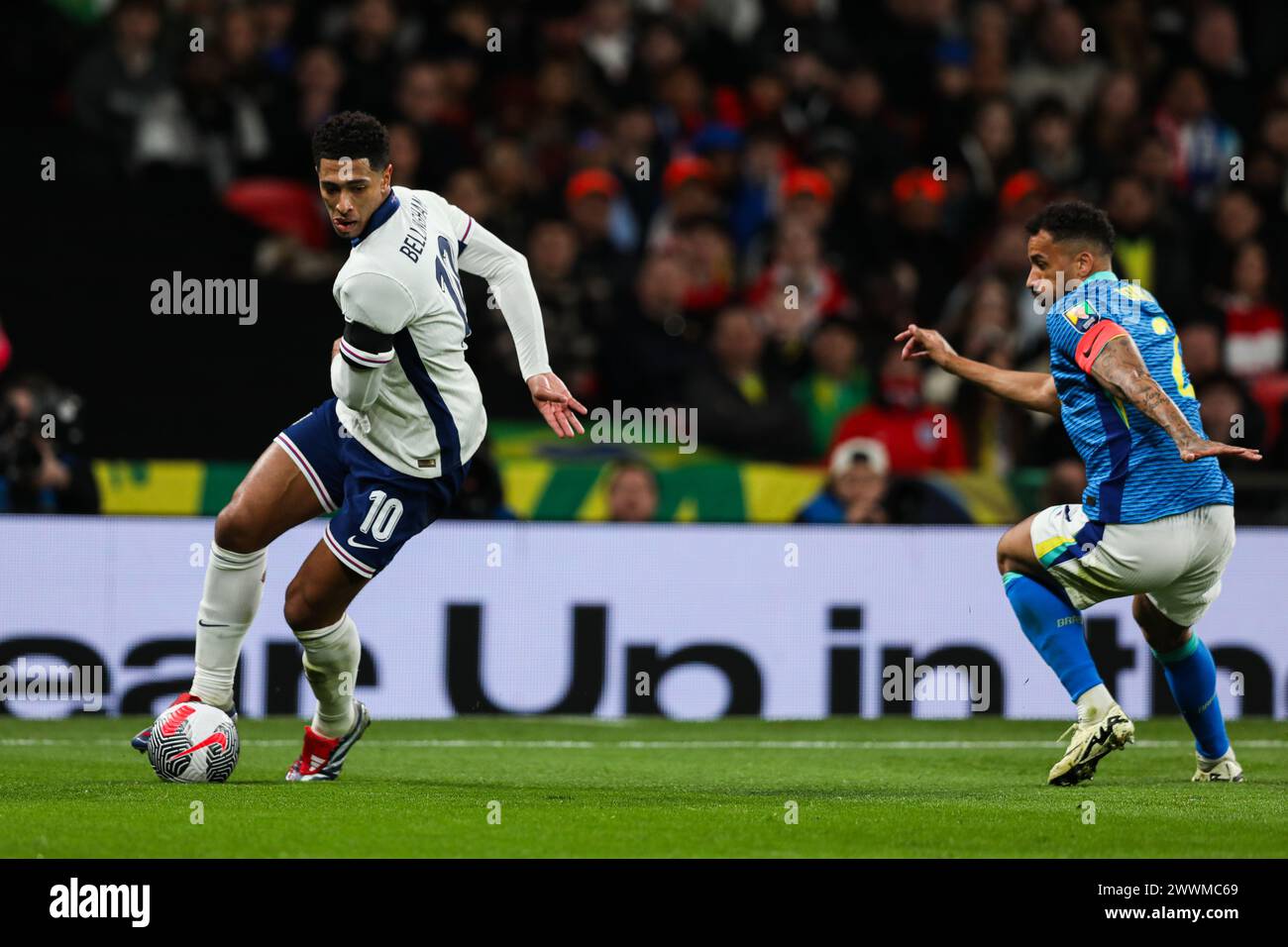 Jude Bellingham of England turning Danilo of Brazil - England v Brazil ... Jude Bellingham of England turning Danilo of Brazil - England v Brazil ...