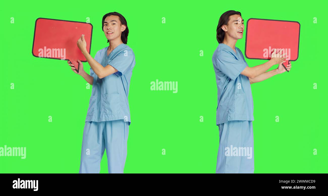 Nurse showing medical sign billboard standing hi-res stock photography ...