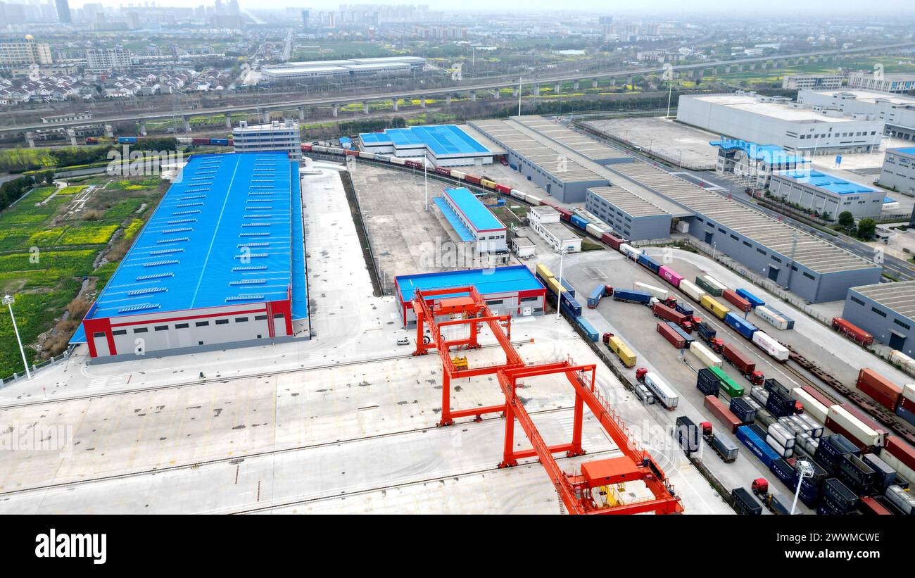 NANTONG, CHINA - MARCH 24, 2024 - Locomotives, lifting machinery and ...