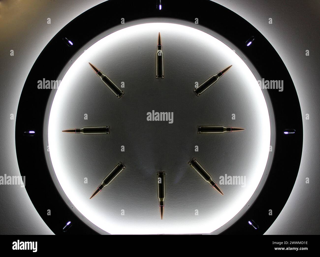 Illuminated Wall Watch Without Arrows With Clock Face Made Of Bullets ...