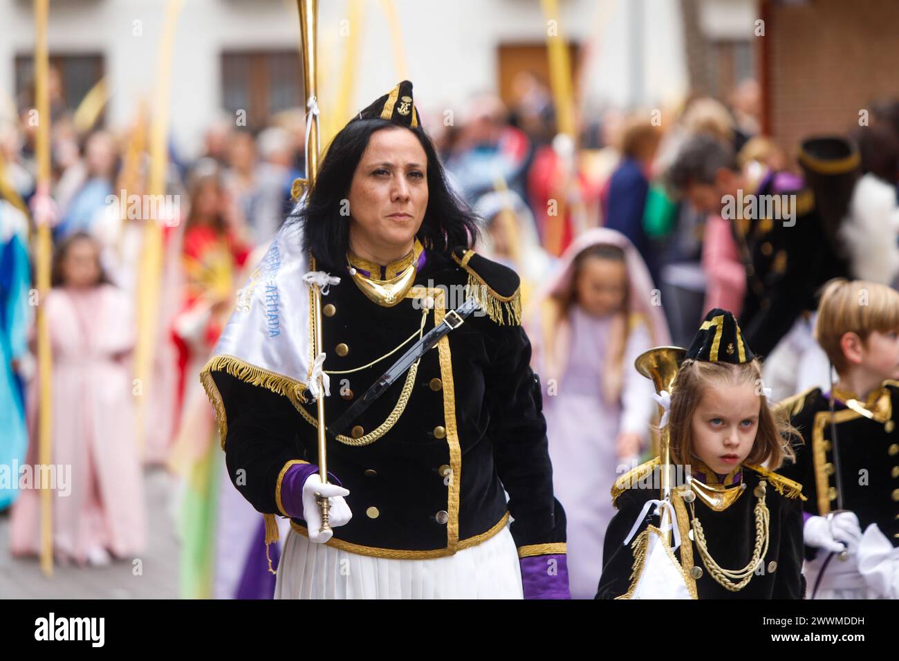 Penitents during a Holy week parade at Cabanyal quarter in Valencia ...