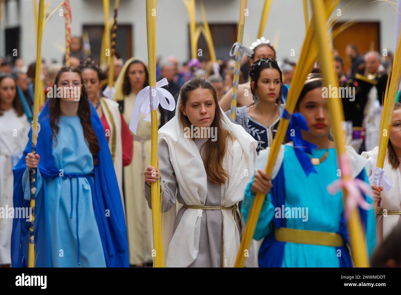 Penitents during a Holy week parade at Cabanyal quarter in Valencia ...