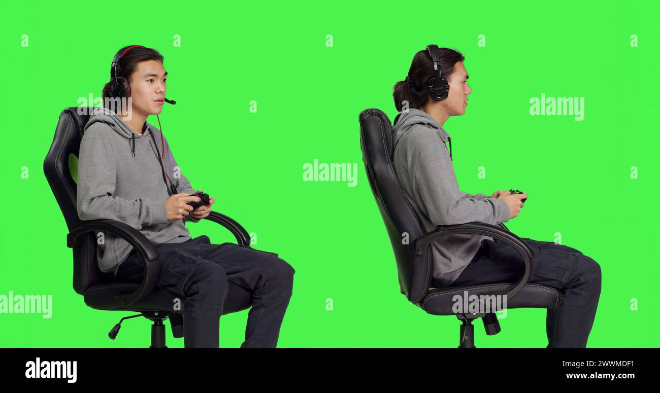 Gamer having fun with rpg challenge over greenscreen background ...